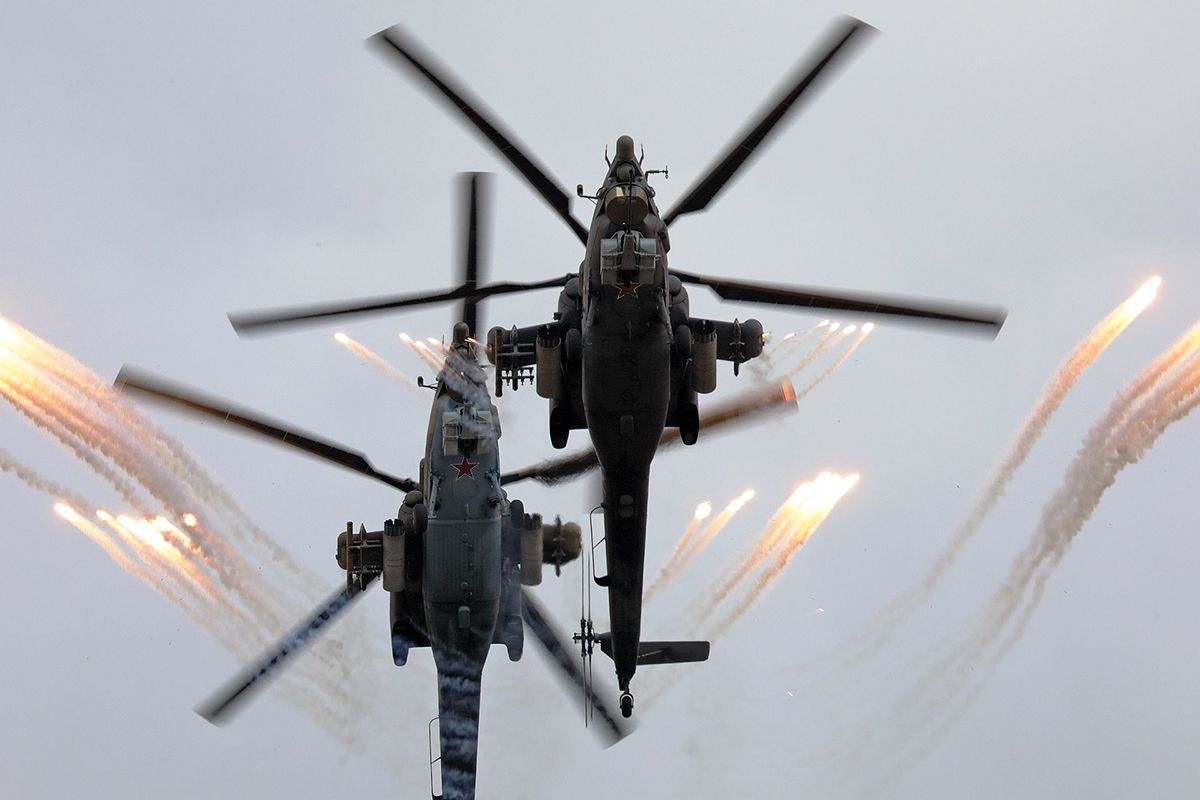 The Mi-28N Night Hunter attack helicopters, shooting of heat traps | Scrolller