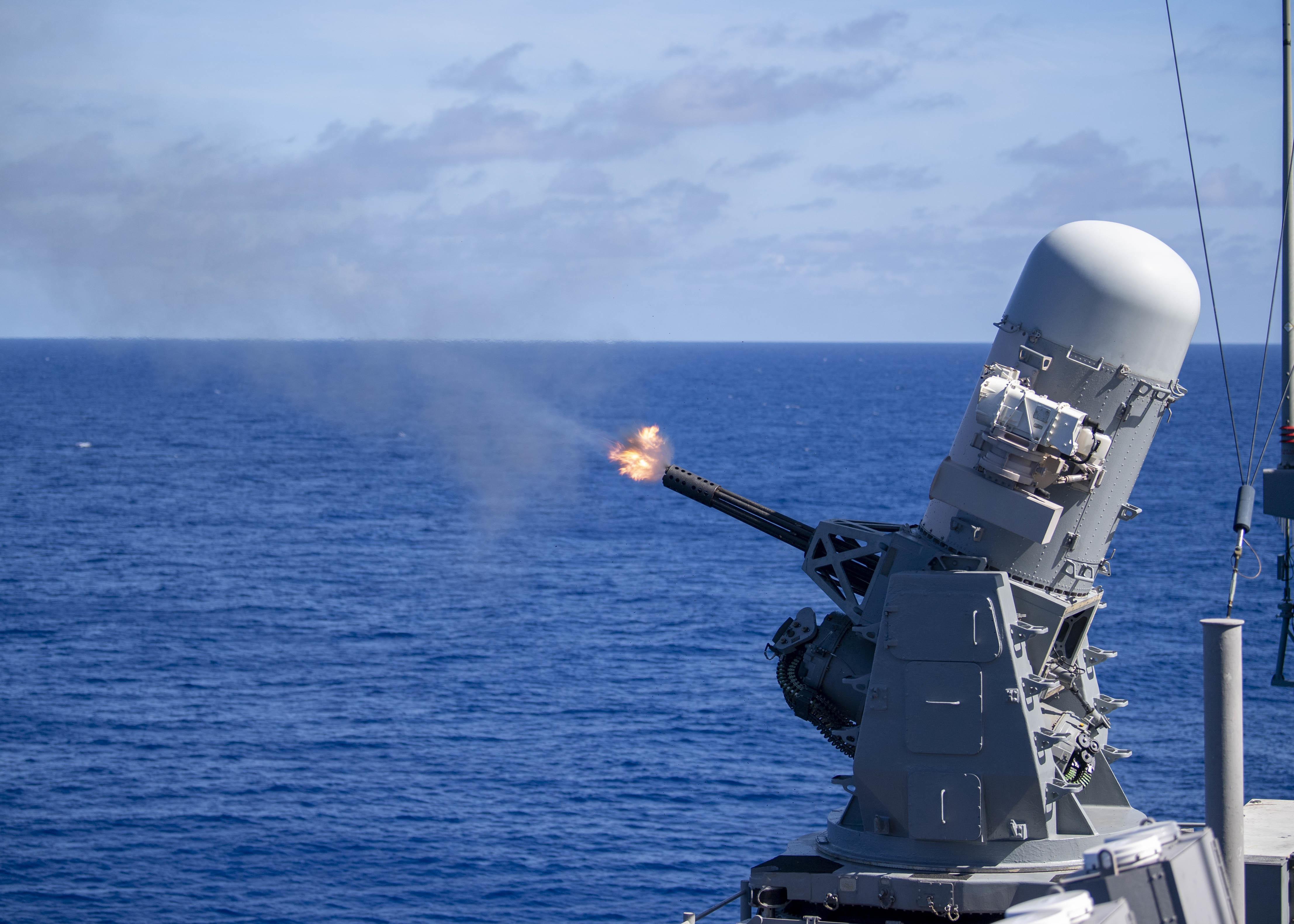 The Phalanx Close-In Weapon System (CIWS) is test fired aboard USS ...
