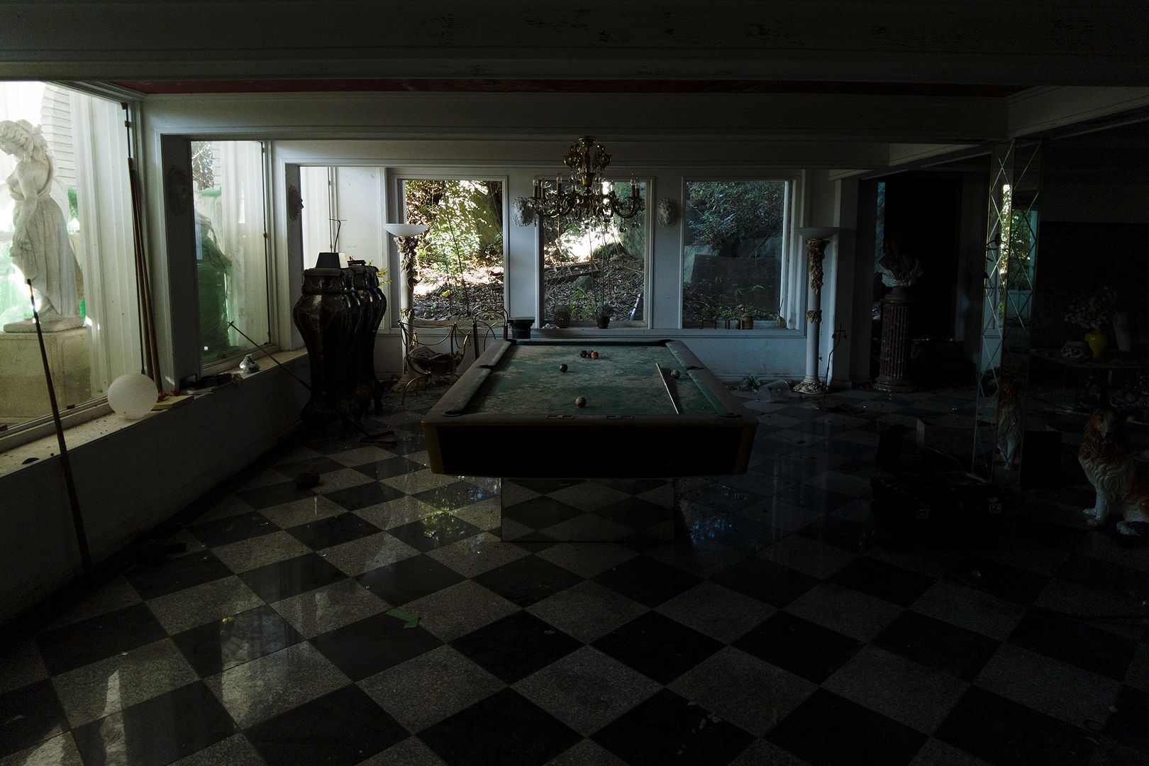 The pool room in Genshiro Kawamoto's abandoned mansion. | Scrolller
