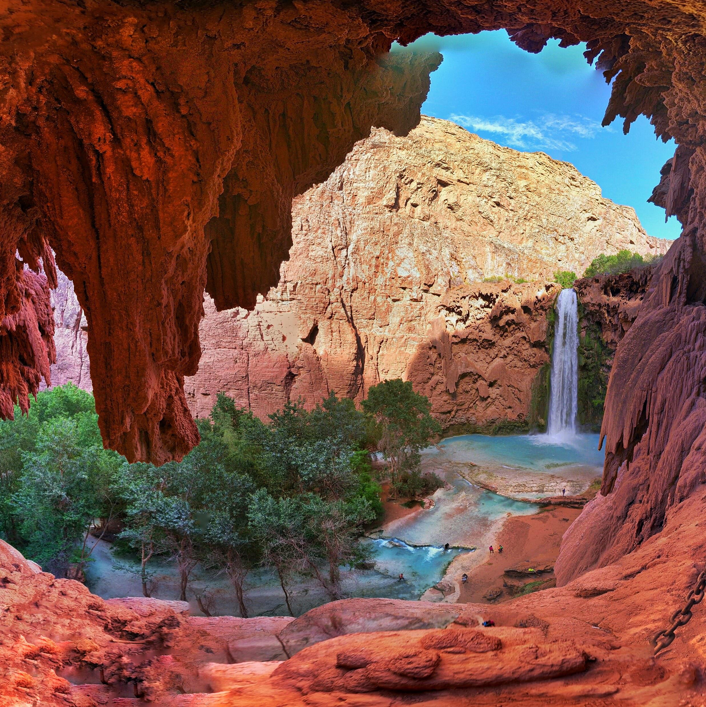 The treacherous trail to the bottom of Mooney Falls winds through some pretty cool caves. Havasu ...
