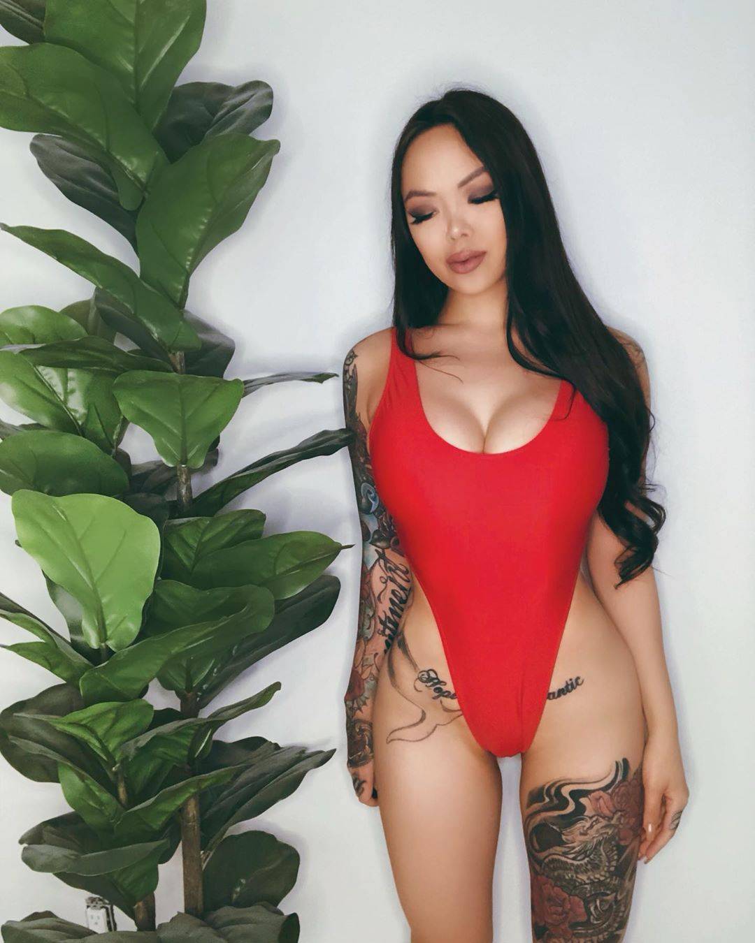 Thick And Busty Asian Bombshell With Tats | Scrolller