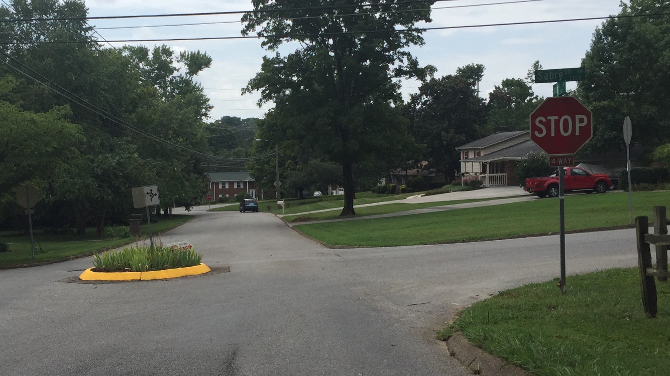 This intersection is a 4-way stop AND a roundabout... | Scrolller