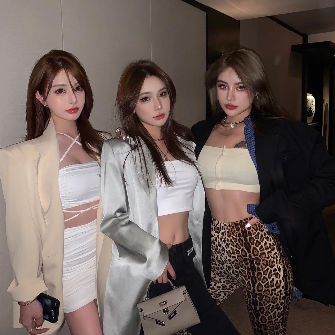 Three Asians | Scrolller