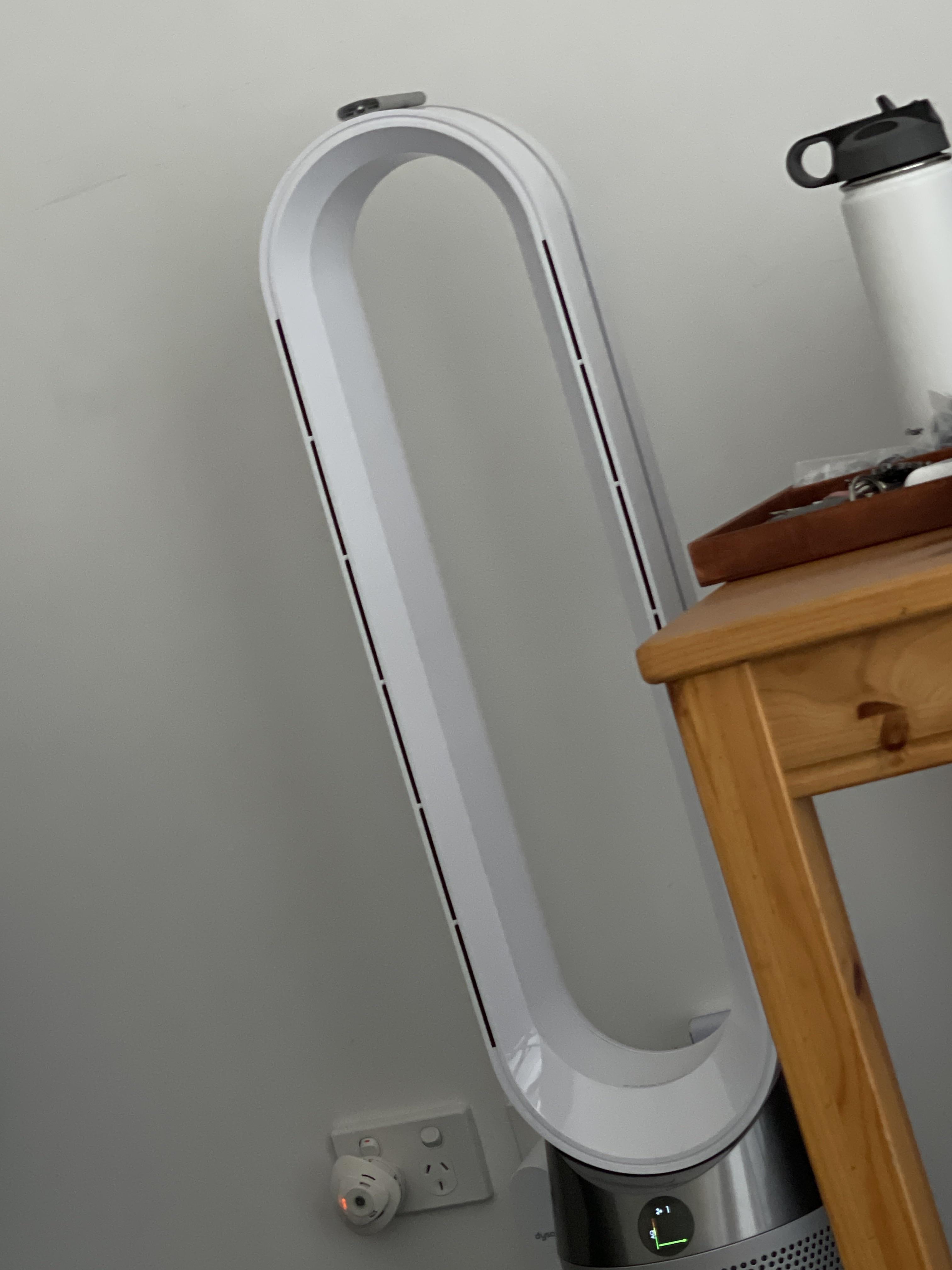 Tower fan (also an air purifier because the guy who used this room before me smoked a lot ...