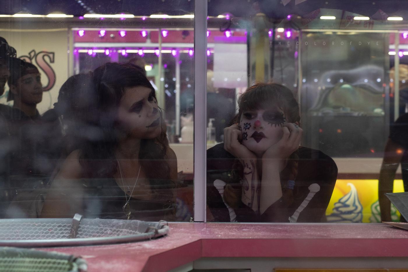 Two clowns in front of a cotton candy machine | Scrolller