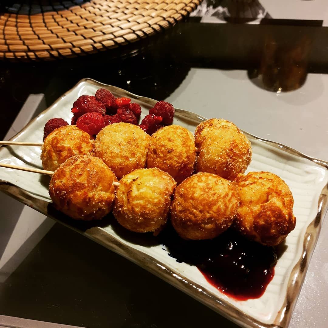 Waffleballs! Made using a takoyaki iron. Filled with fresh raspberries ...