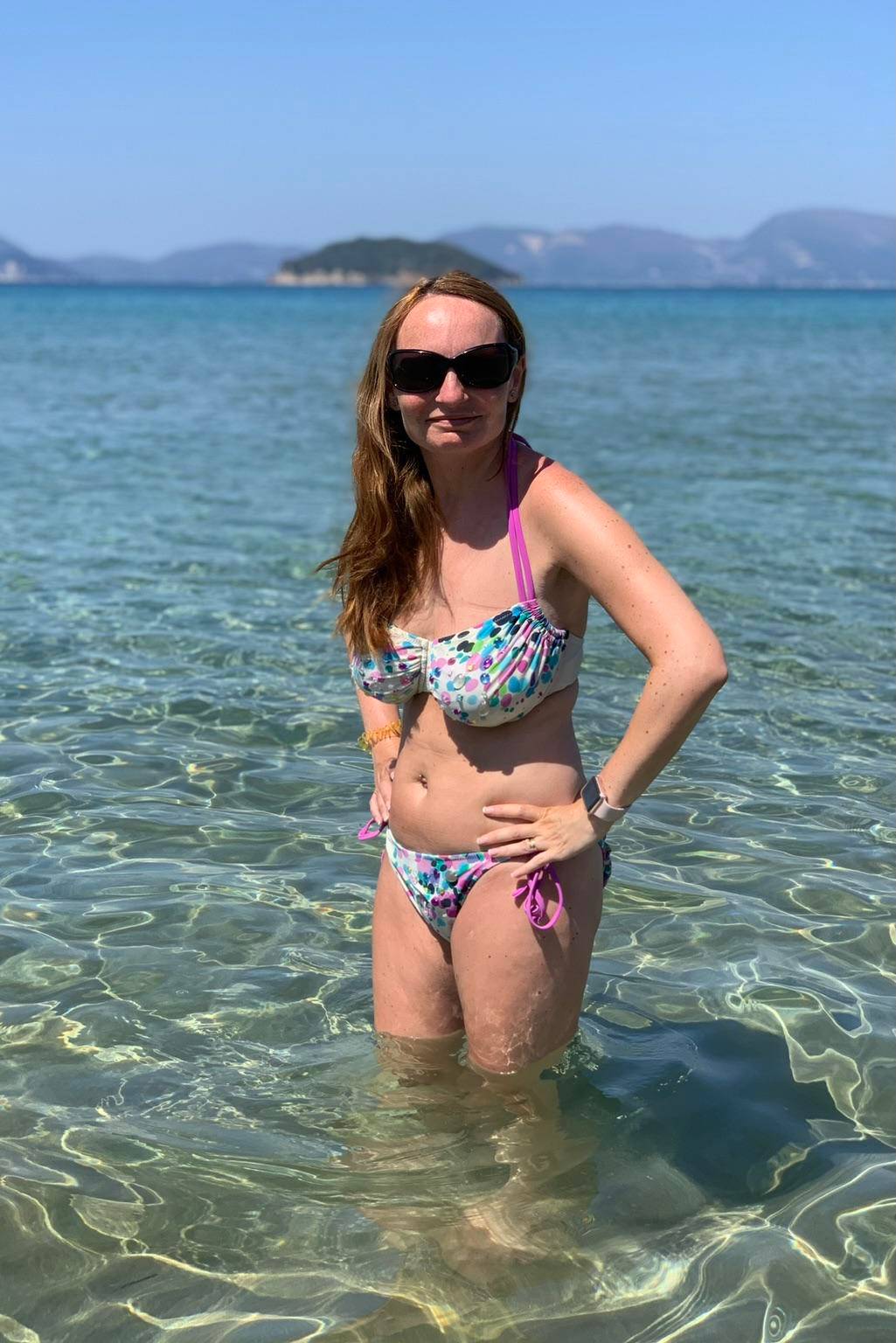 Wife sunning in the sea | Scrolller