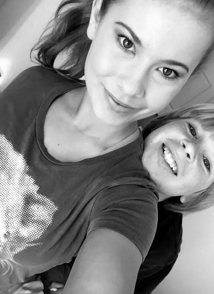 With her brother | Scrolller