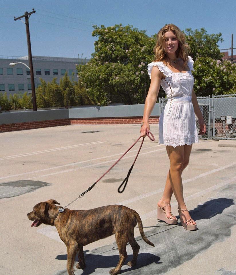 With her pup | Scrolller