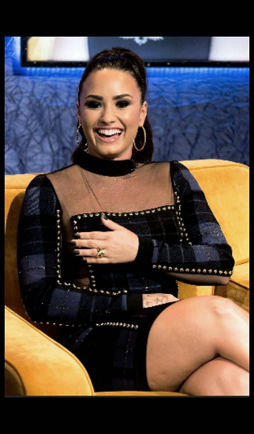 Woman Sitting Down With Her Legs Crossed Has A Couple Of Cellulite Dimples | Scrolller