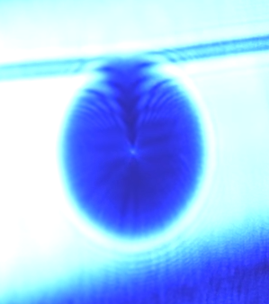 You are seeing quantum mechanincs in action! If a beam of light passes through a sphere, there ...