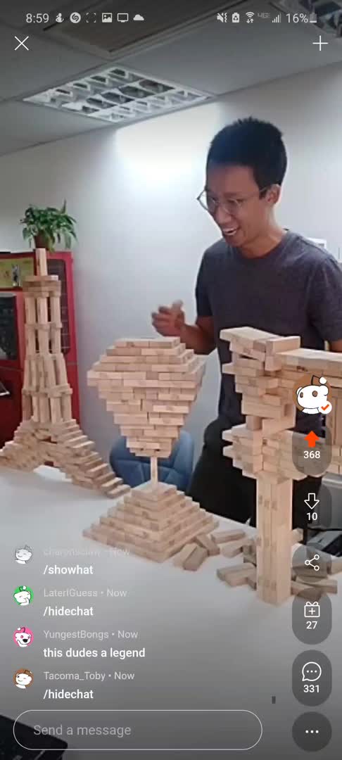 Celebrating by dropping the last tile on your Jenga build | Scrolller