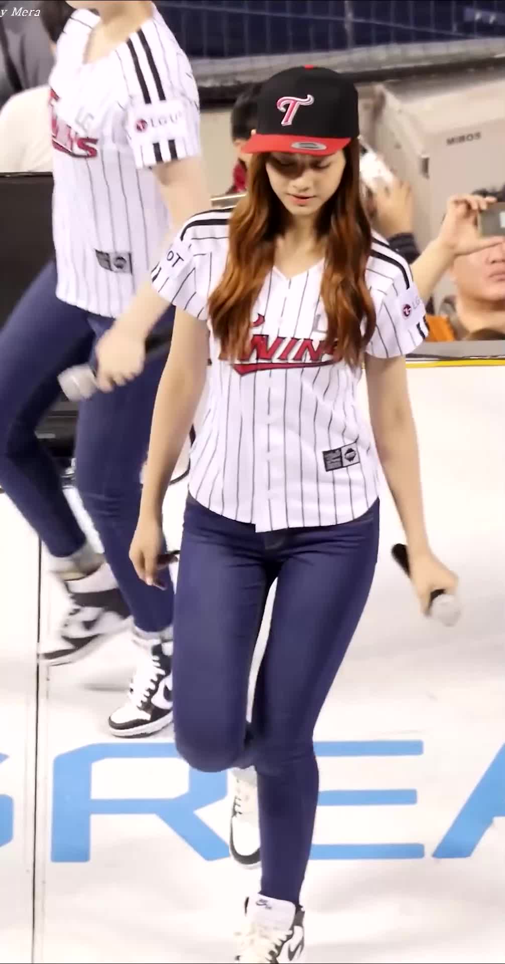 Tzuyu - jeans, twins striped shirt, black & red baseball cap, loa performance | Scrolller