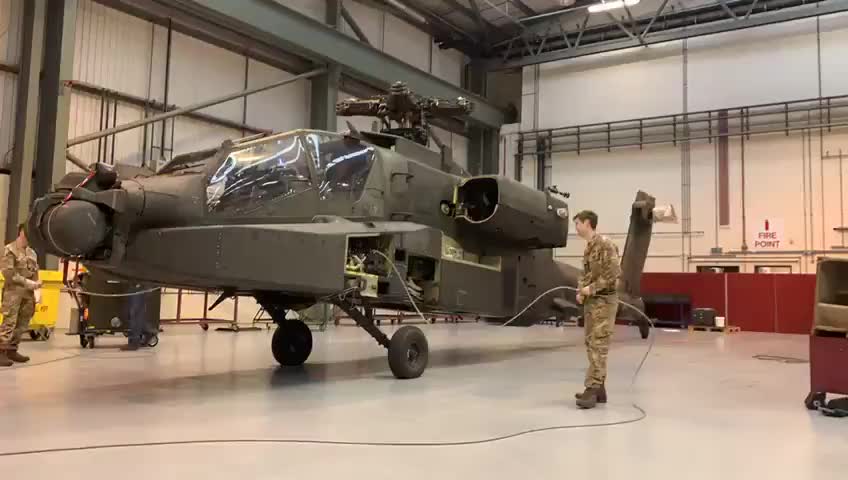 Bringing AH-64 Apache to its knees to fit it inside the cargo hold of A400M | Scrolller