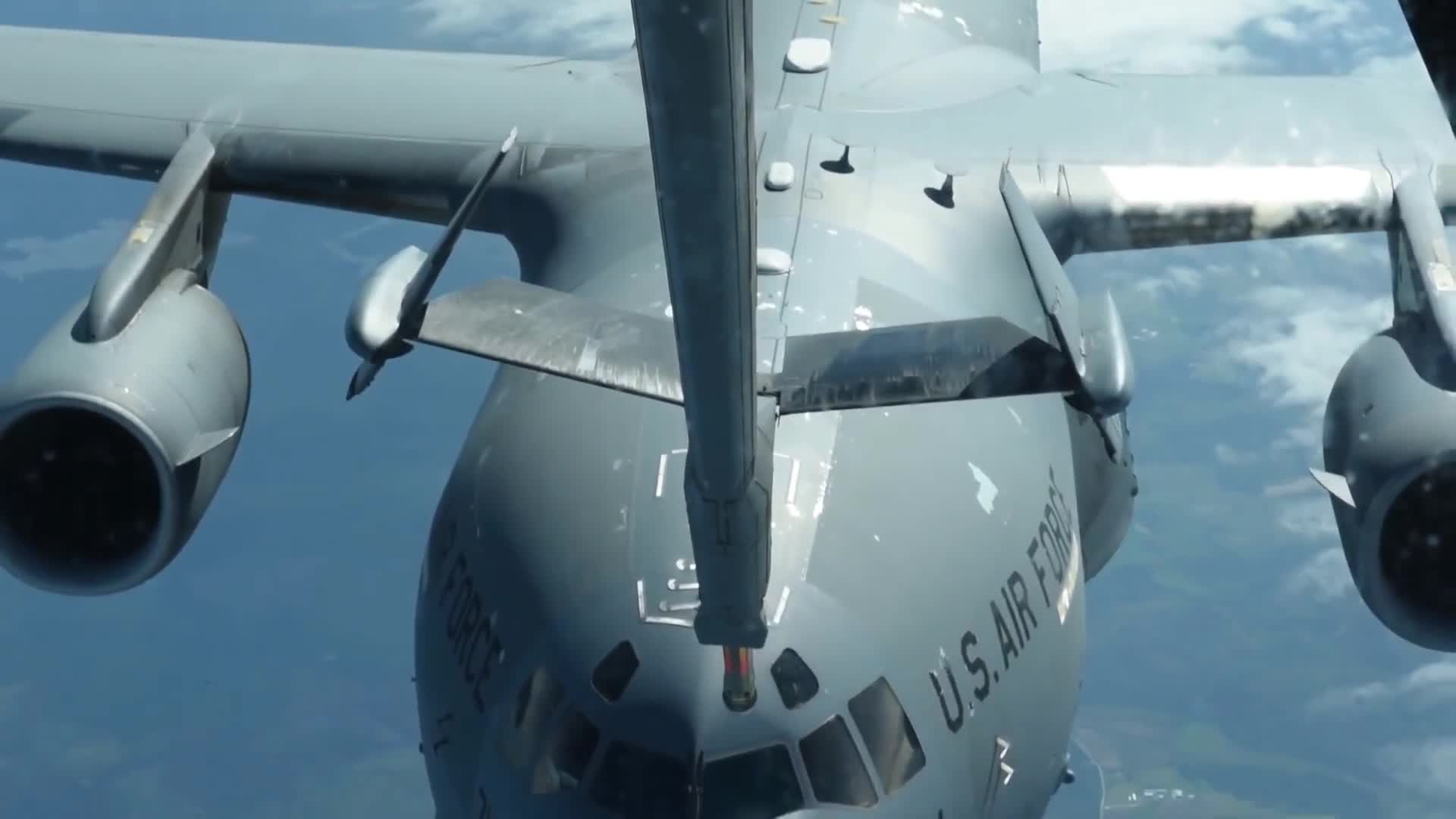 USAF C-17 aerial refueling operation with a KC-10 Extender | Scrolller