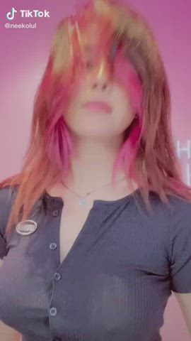 It looks like she’s braless and those buttons are putting in some serious work! Enjoy! | Scrolller