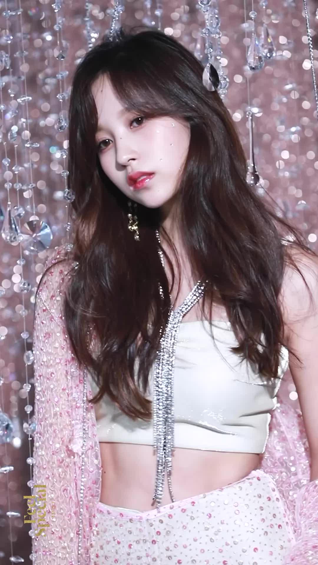 Mina - white top, close up | Scrolller