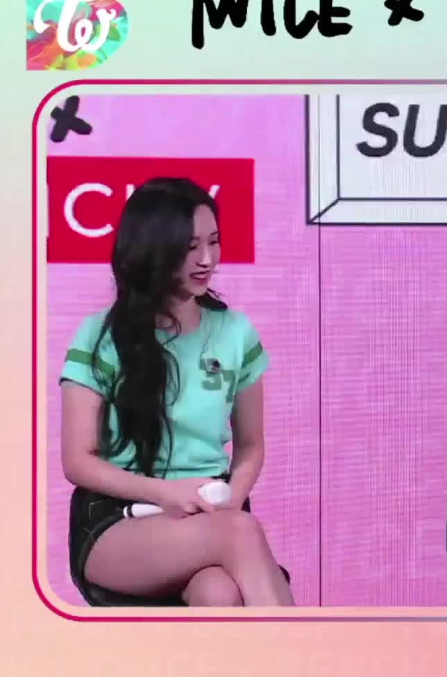 Mina - green t-shirt, black jean shorts, Twice x Bench Fan Event | Scrolller