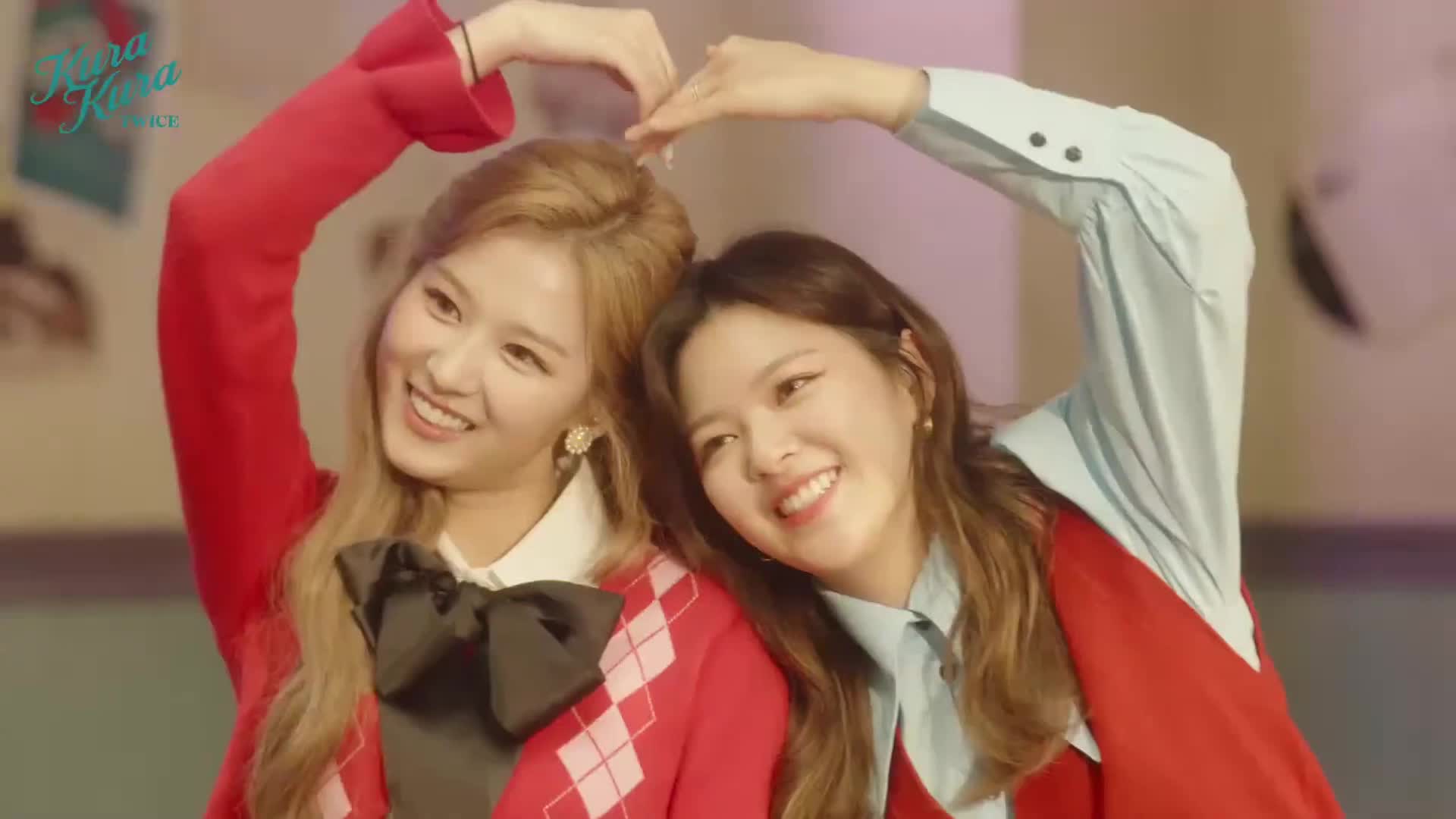 210512 - Sana and Jeongyeon sending a heart | Scrolller