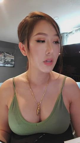 Hmong chick talks about and gropes her big, fake tits on Facebook Live | Scrolller