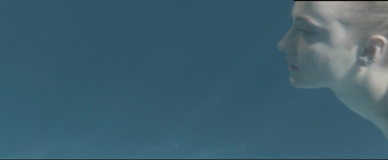 Sophie Turner swimming underwater | Scrolller