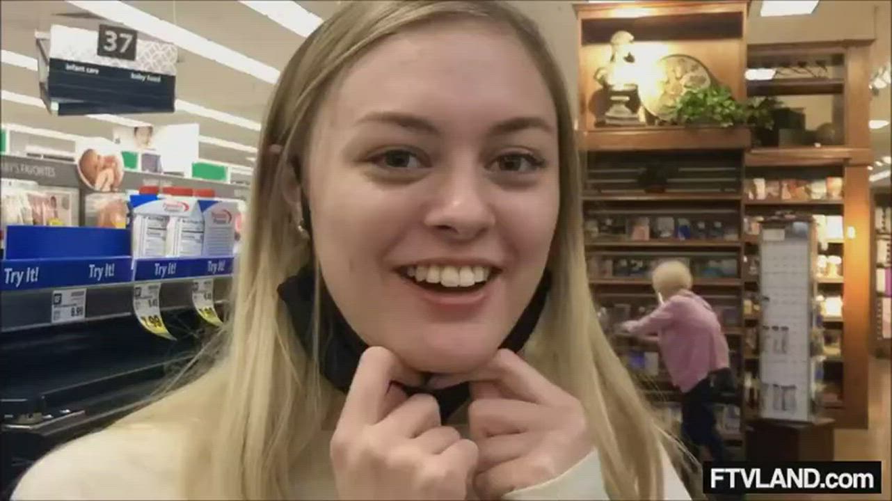 Happy Embarrassed Girl Flashing In A Store Scrolller