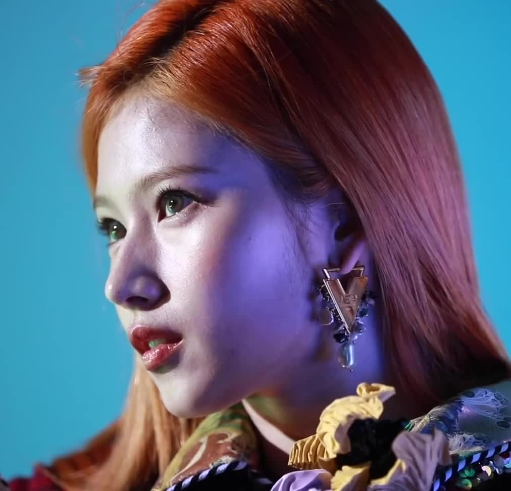 Sana -red hair, close up | Scrolller