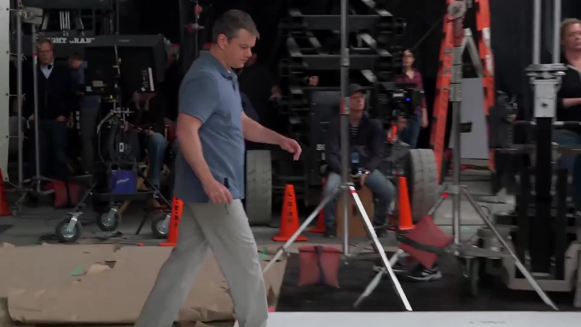 Matt Damon signing a prop contract in 'Downsizing' | Scrolller
