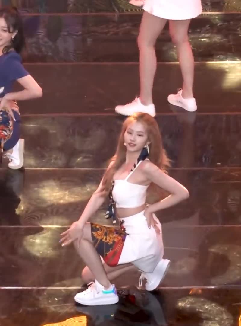 Sana - light red hair, white skirt, top, alcohol free performance | Scrolller