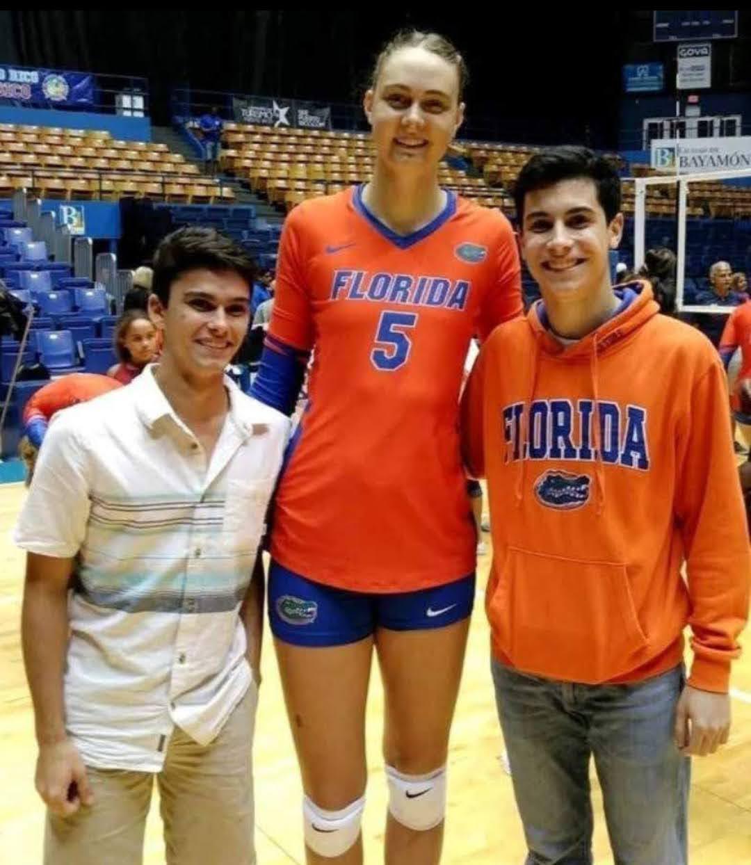 6'8" Rachael towering over guys | Scrolller