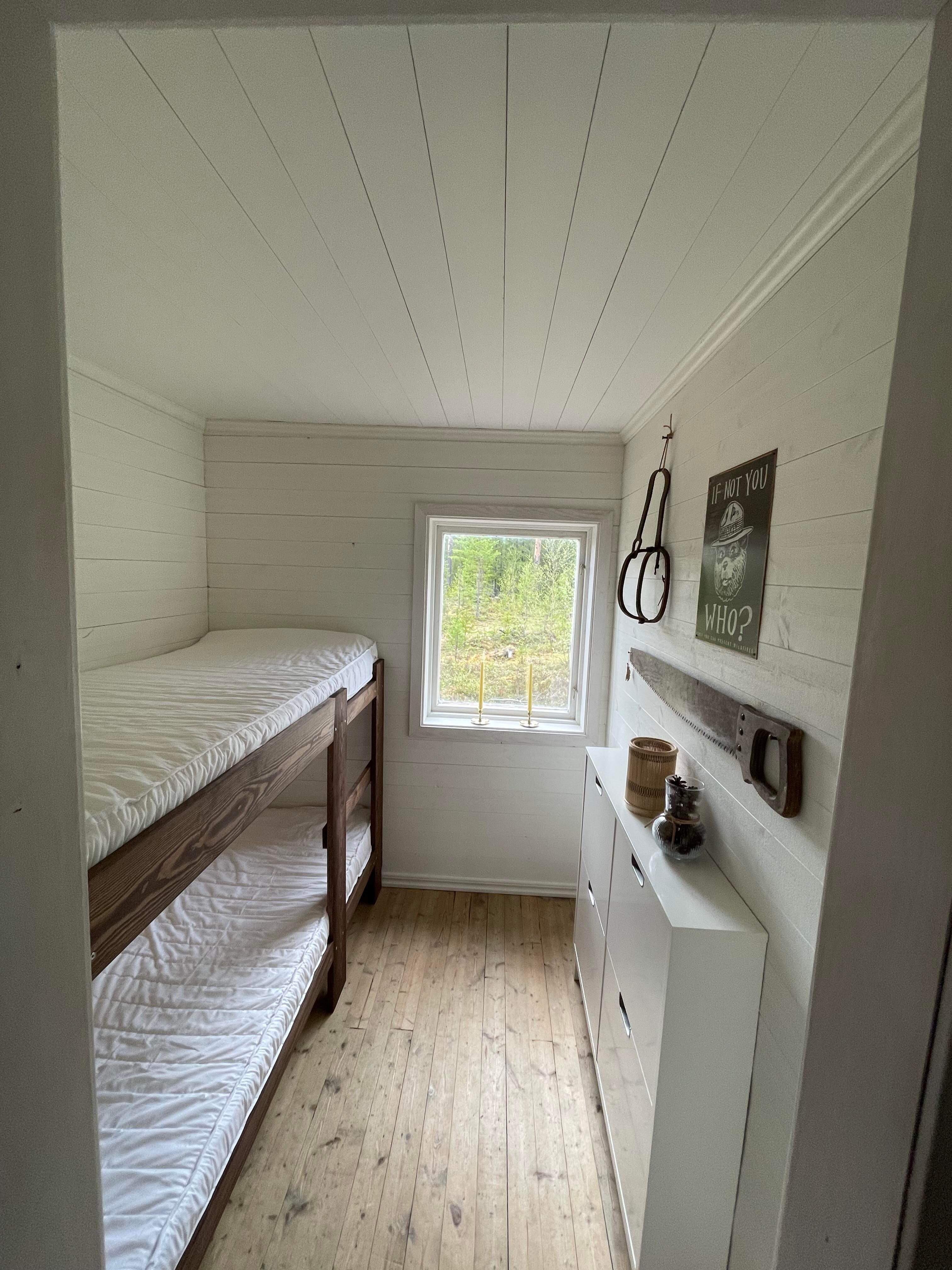 Bedroom in small hunting & fishing cabin | Scrolller