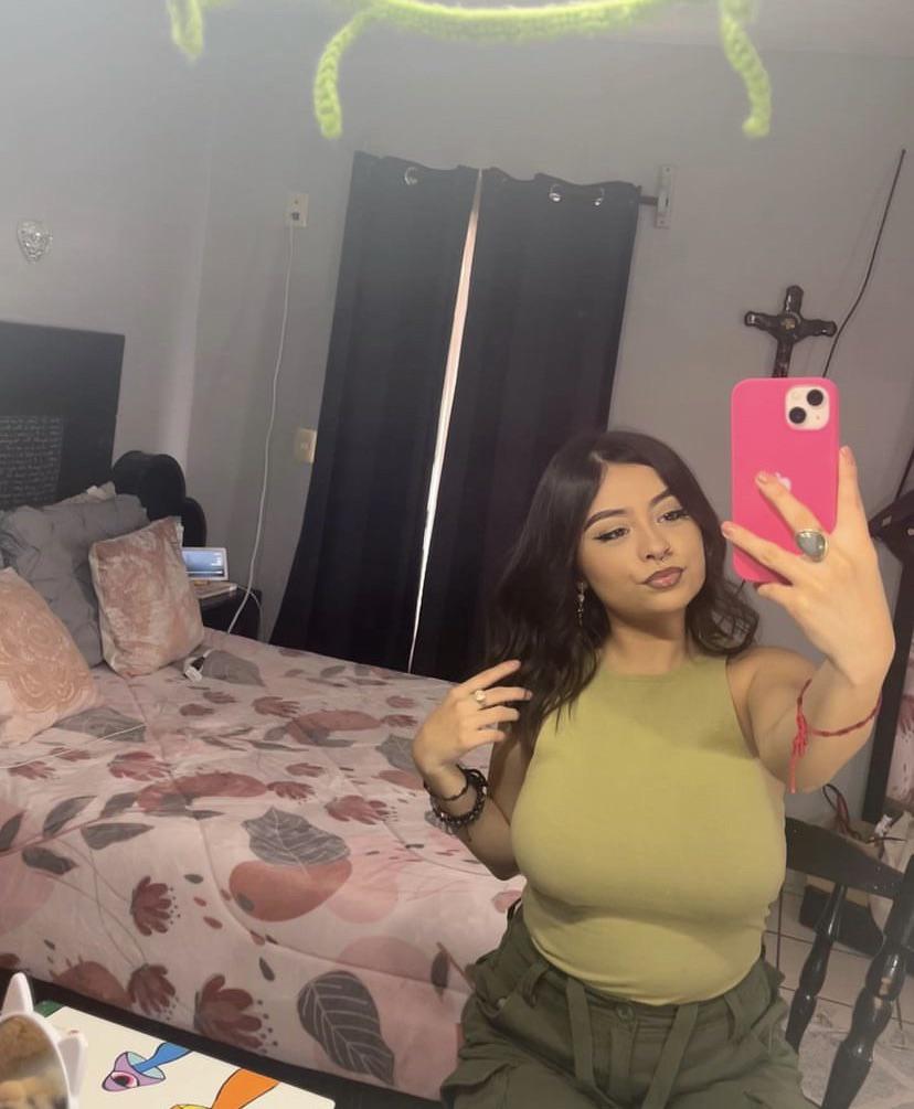 Busty in green | Scrolller