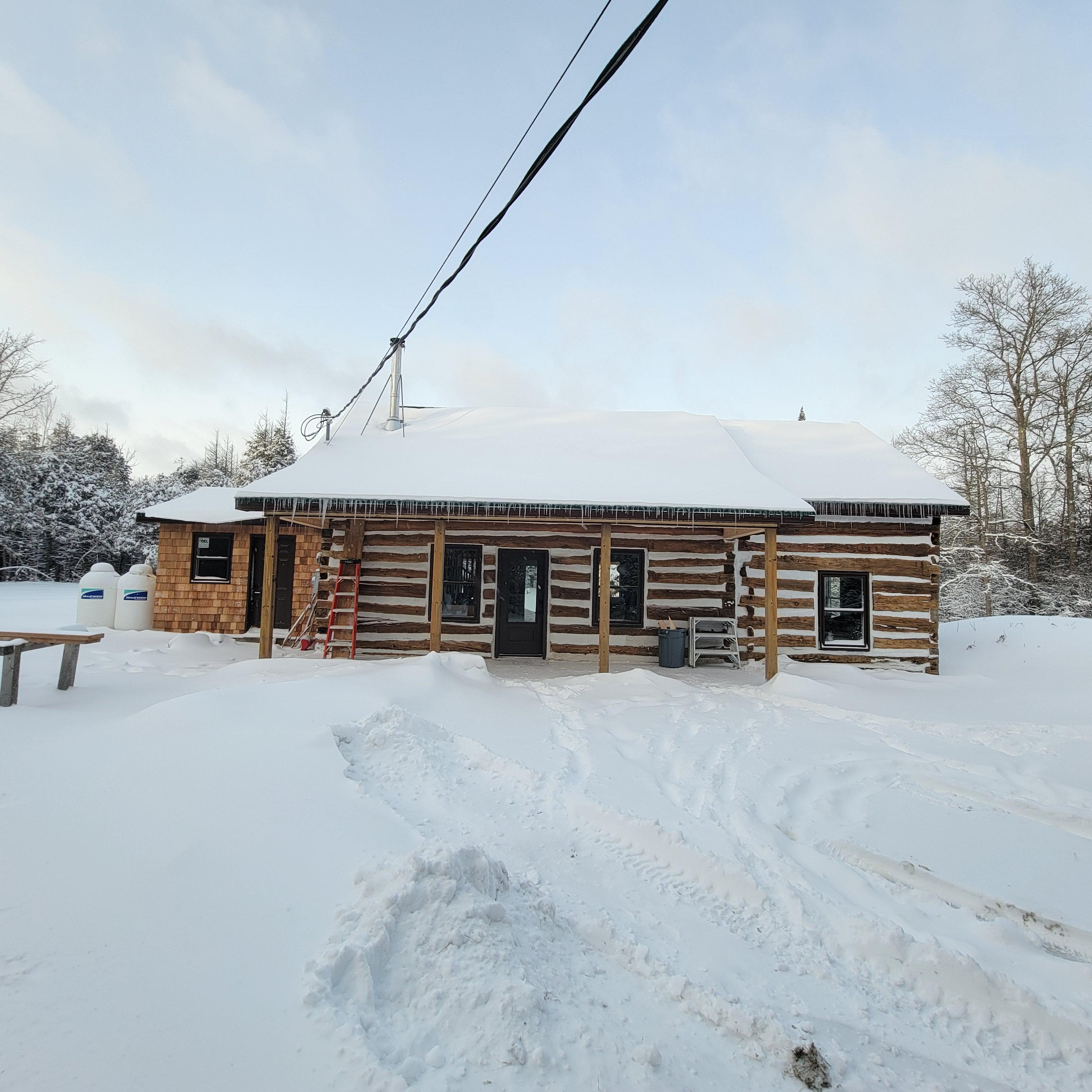 Cabin looking happy with some fresh snow! | Scrolller
