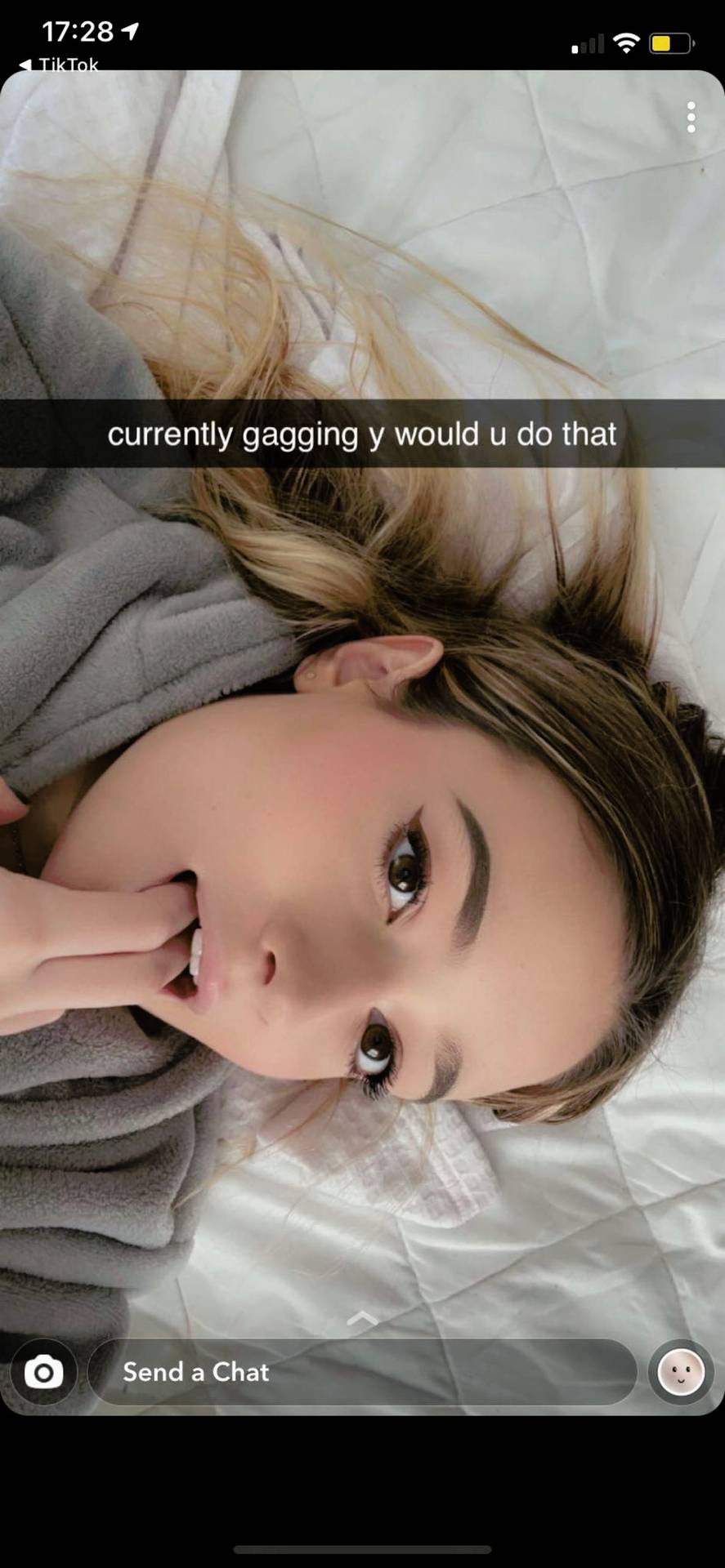 Caitlin gagging herself with her fingers | Scrolller