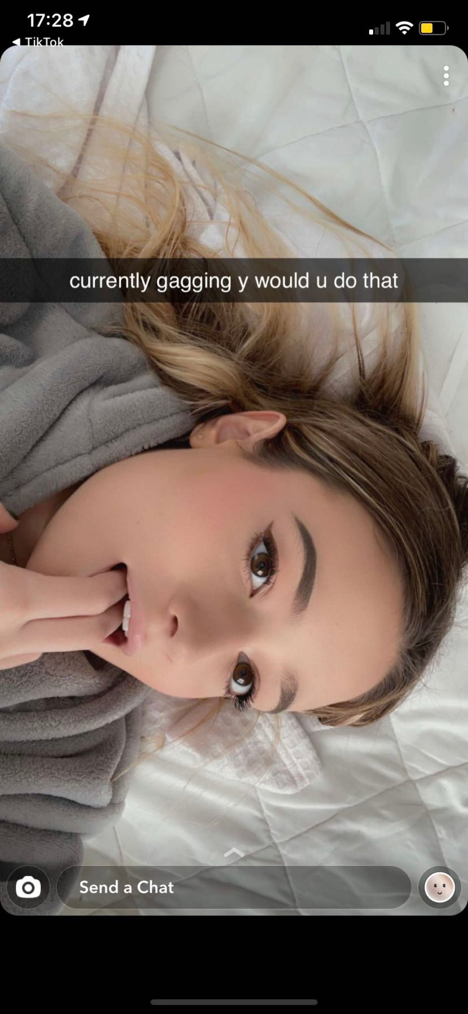 Caitlin gagging herself with her fingers | Scrolller