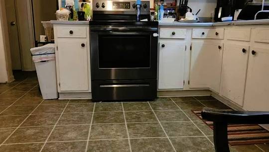 Cleaning up the kitchen. | Scrolller