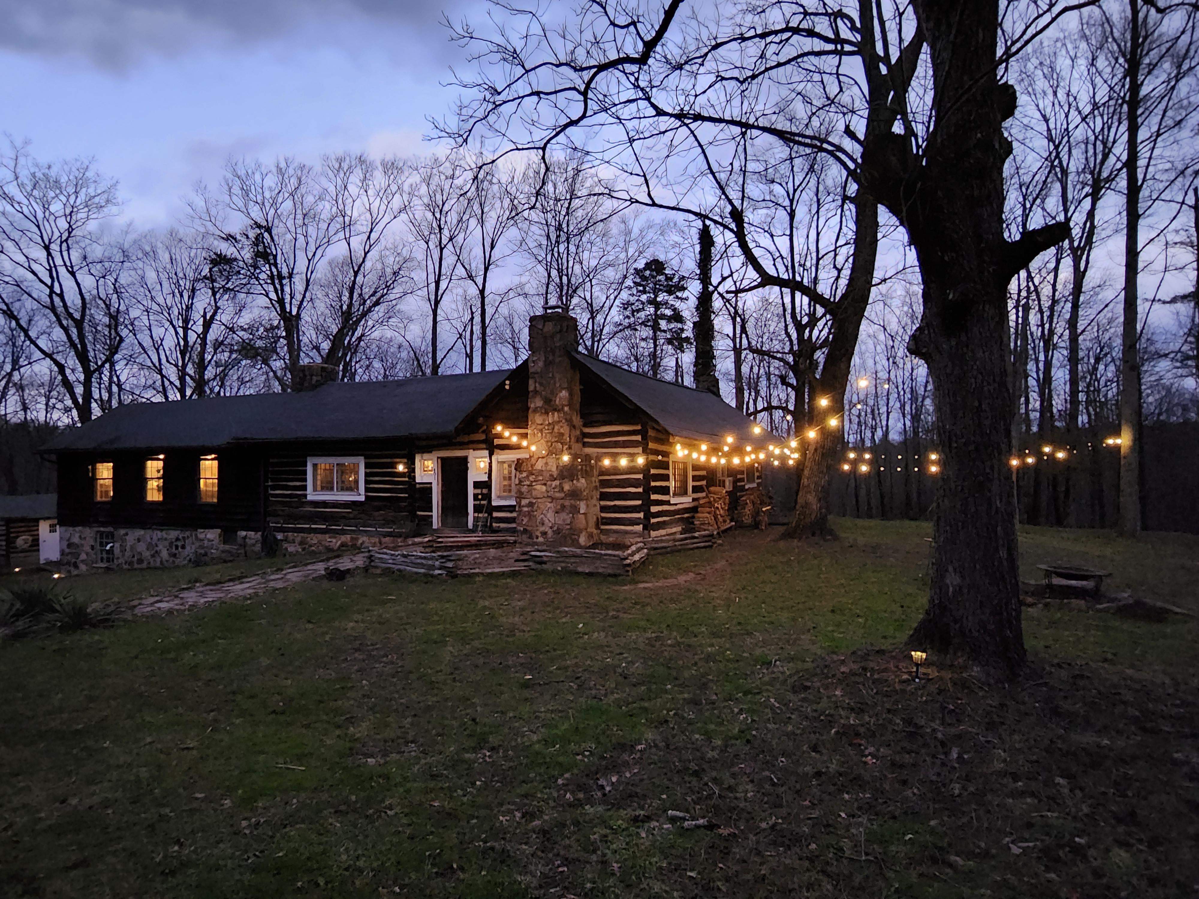 Dark winter evening in the cabin. | Scrolller