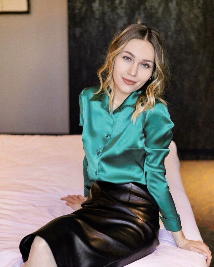 Green Satin Blouse on Bed | Scrolller