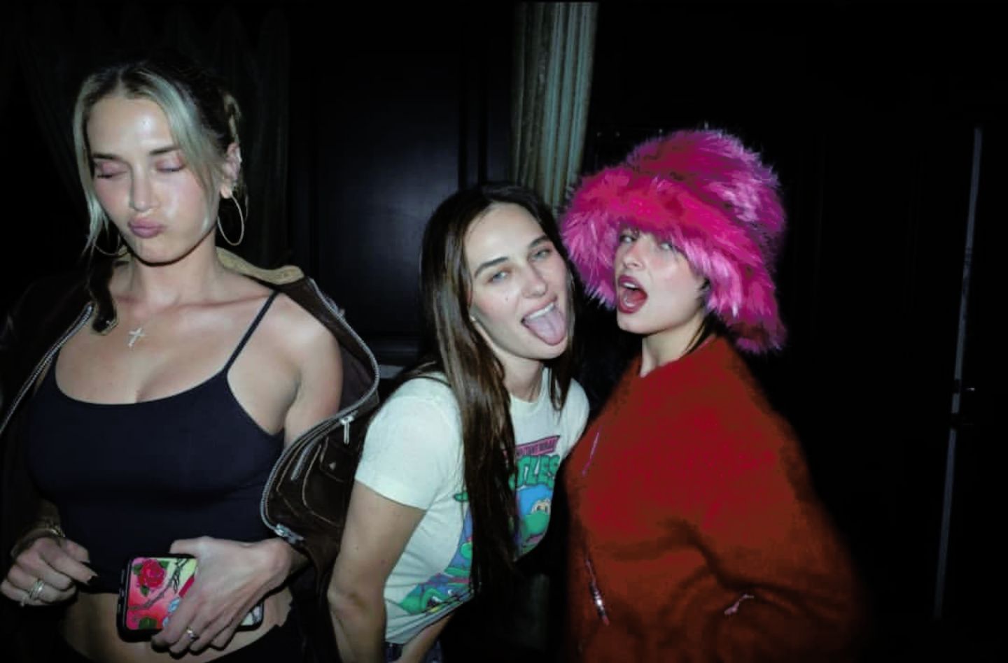 In pink hat with friends | Scrolller