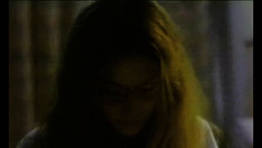 Jessica Pare in En Vacances (2000) - | Scrolller