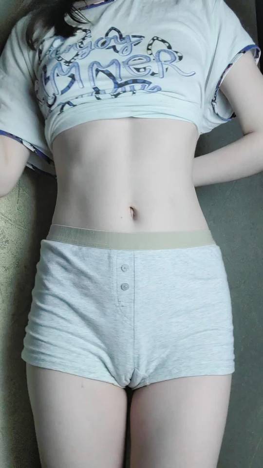 Alluring Busty Girl in a Colorful Garden | Scrolller