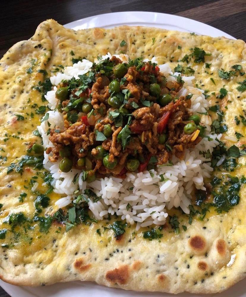 Keema with rice on garlic flatbread | Scrolller