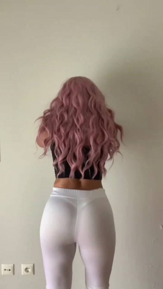 My provocative allure is heightened as I confidently showcases her curves in tantalizing see ...