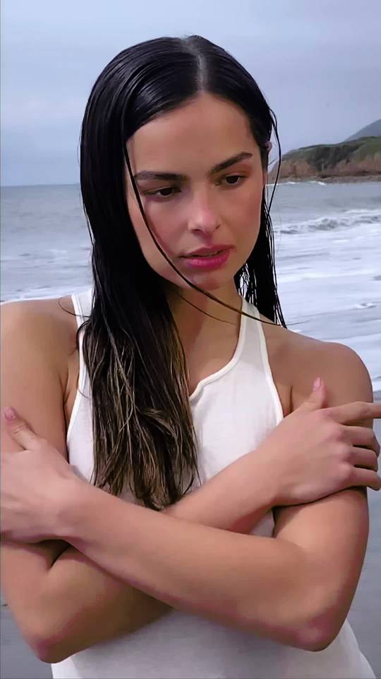 Posing on the beach | Scrolller