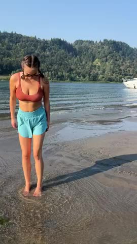 Stripping down at the river | Scrolller