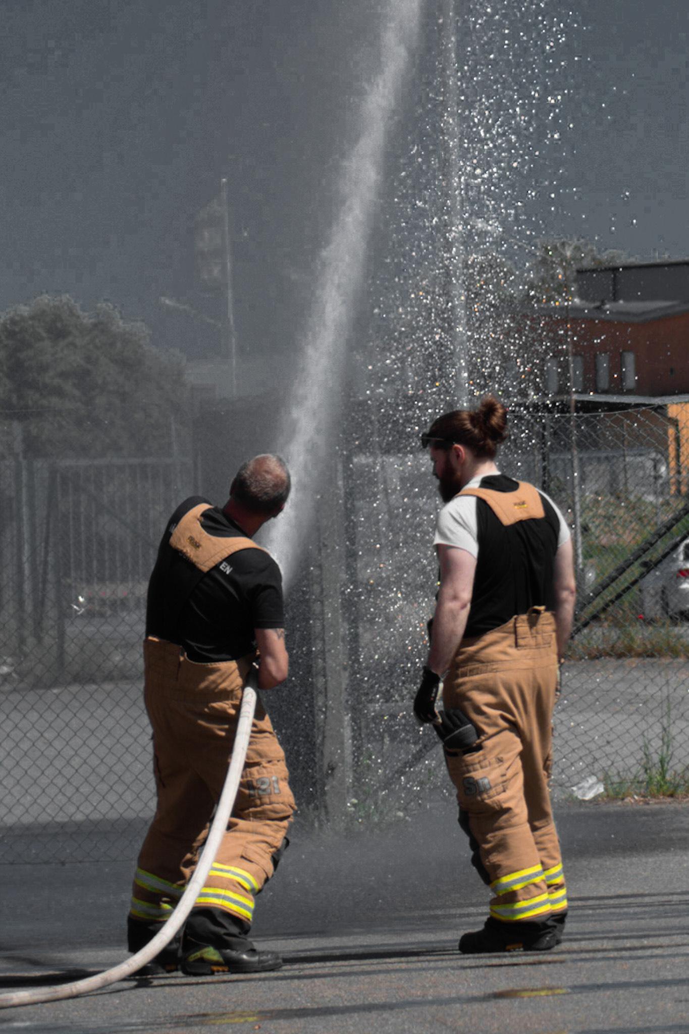 two men and a hose | Scrolller