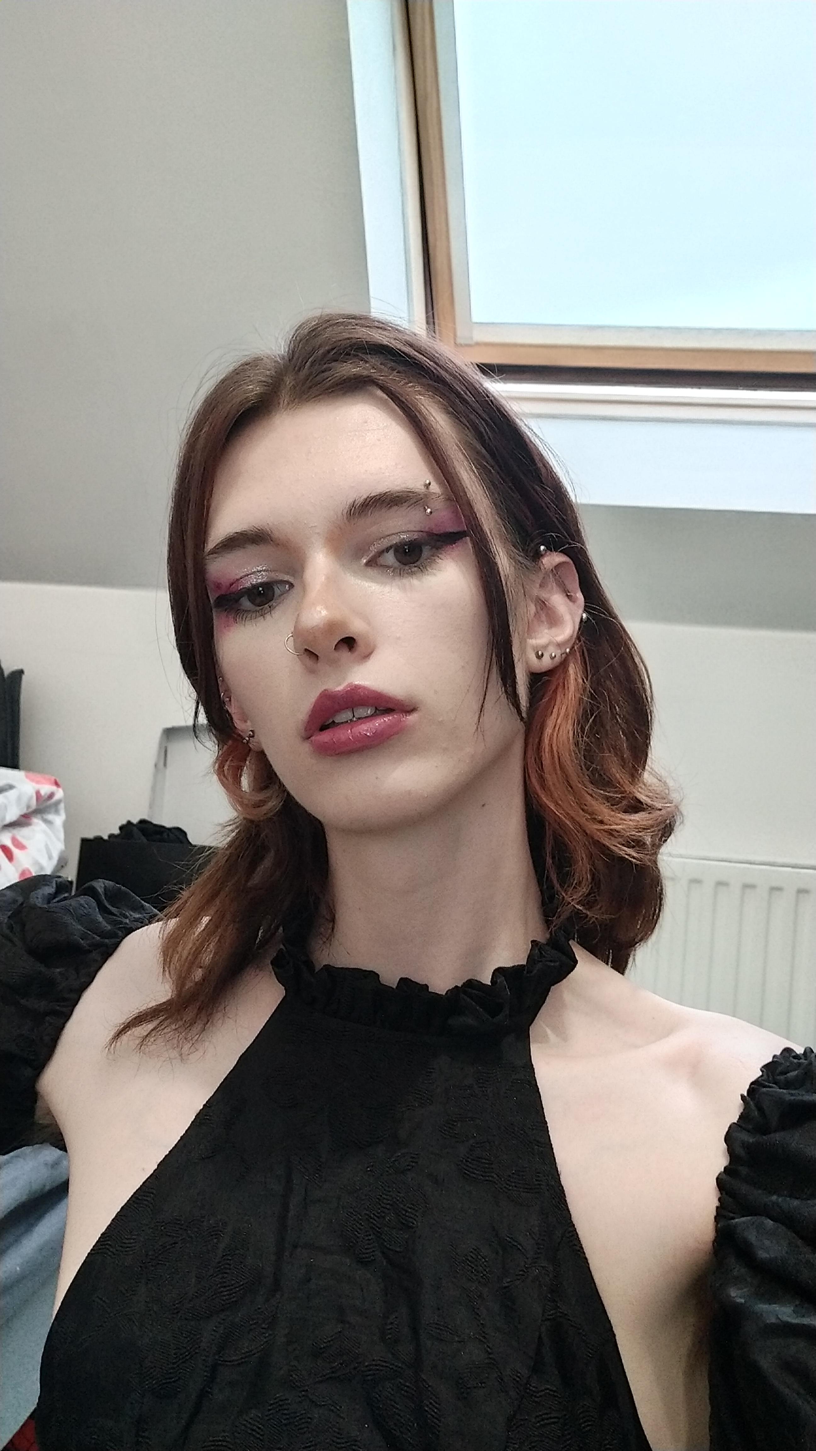 Working on my makeup | Scrolller