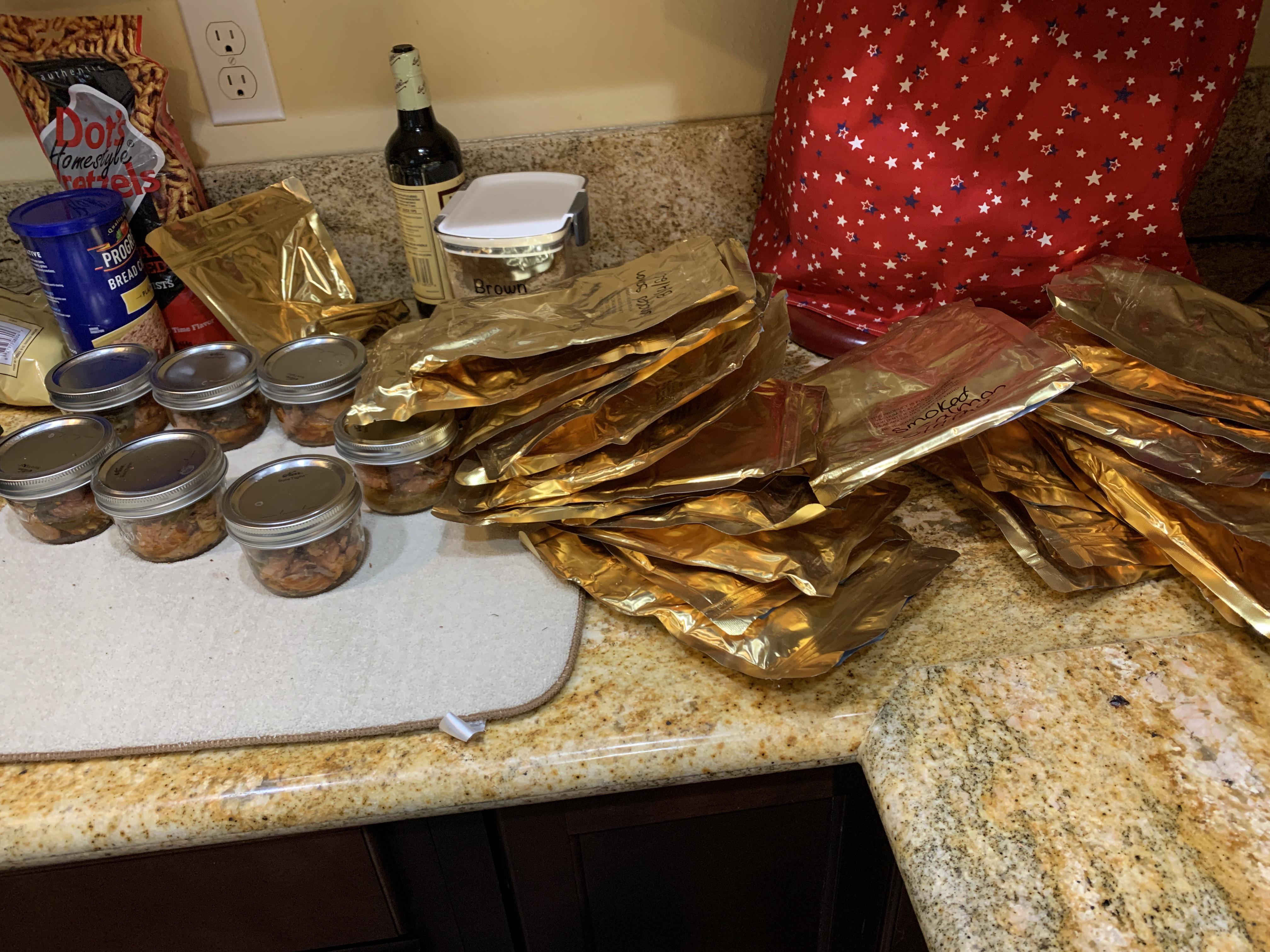 40 pounds of alaskan salmon canned and ready for the winter. | Scrolller