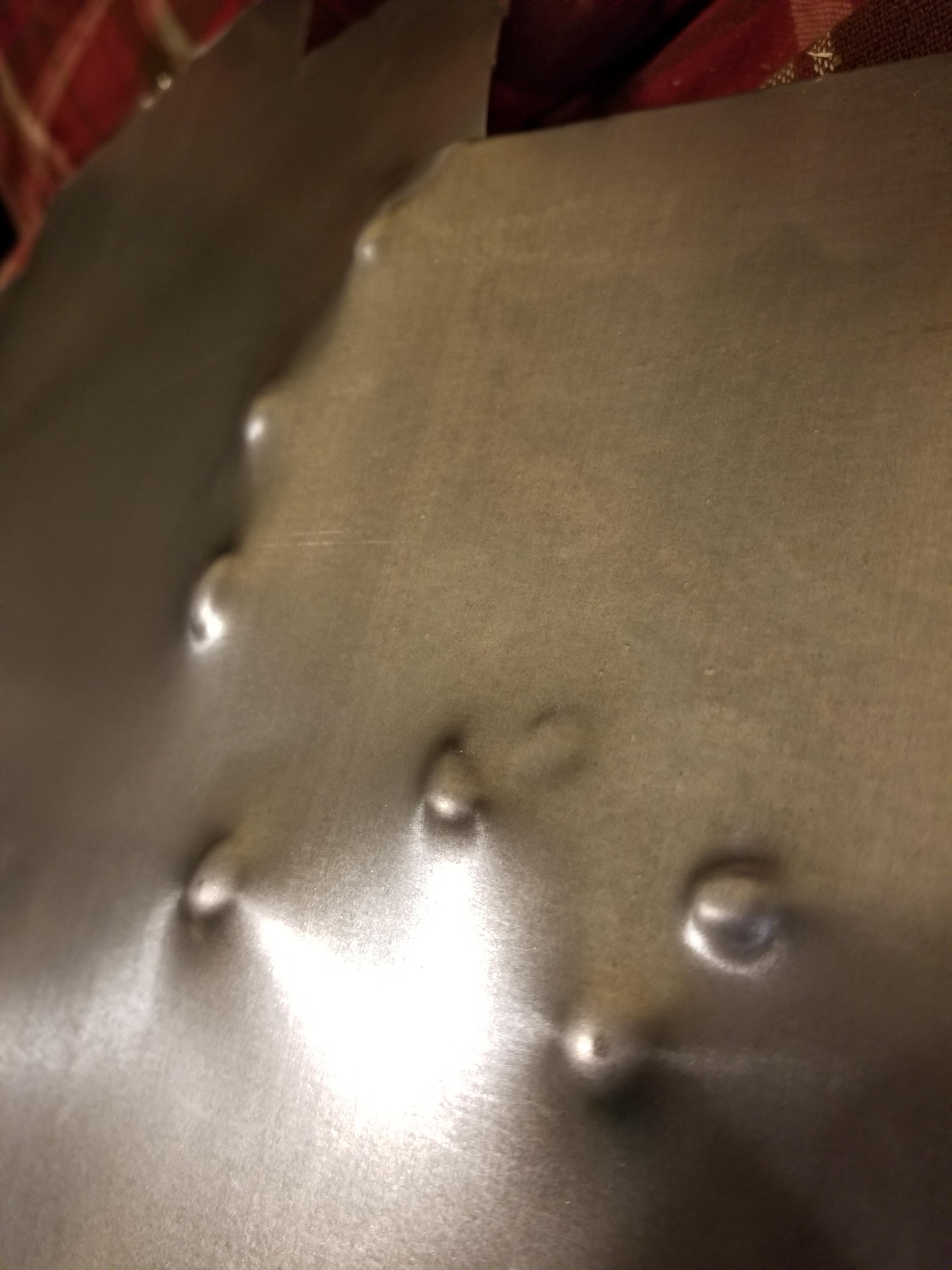 .50 cal 230gr lead vs 1mm sheet steel impacts using 4x4 sterling 117b | Scrolller