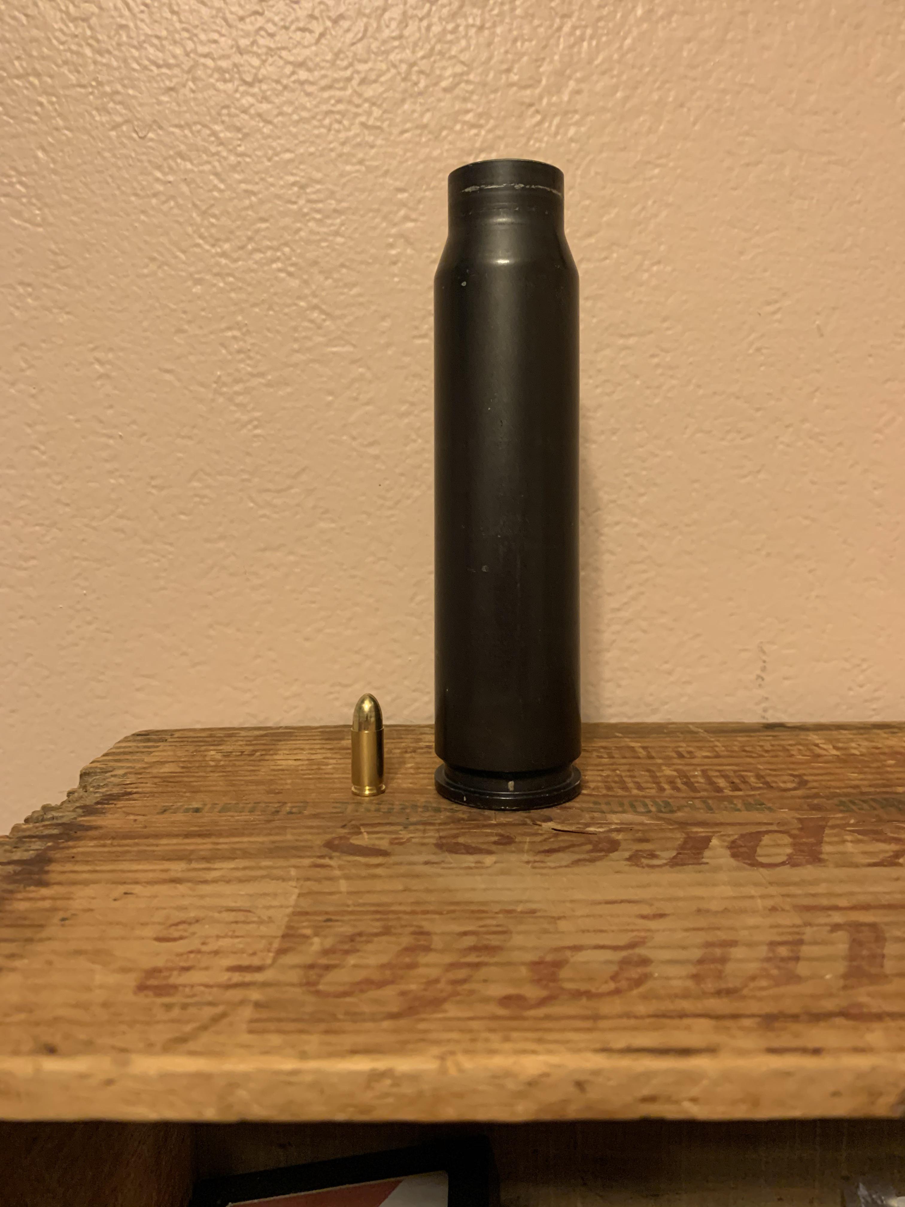 A 9mm round compared to an A-10 Warthog casing | Scrolller